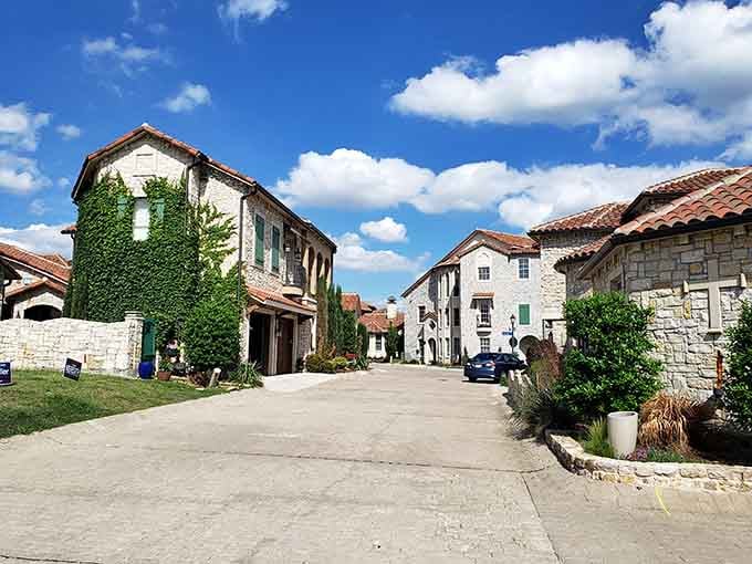 Ivy-covered walls and cobblestone streets whisper "Croatia" while the Texas sky overhead cheerfully shouts "Howdy!"