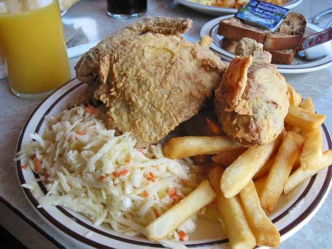 Fried chicken so golden and crispy it makes you forget every diet you've ever attempted or considered attempting.