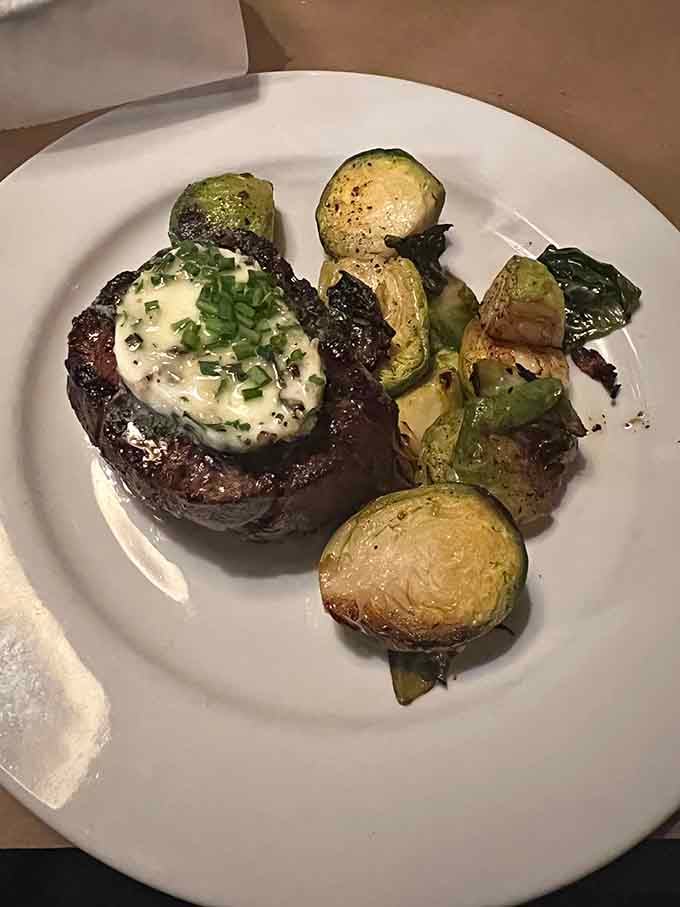 Filet mignon topped with blue cheese and crispy onions, because sometimes more really is more in the best way.