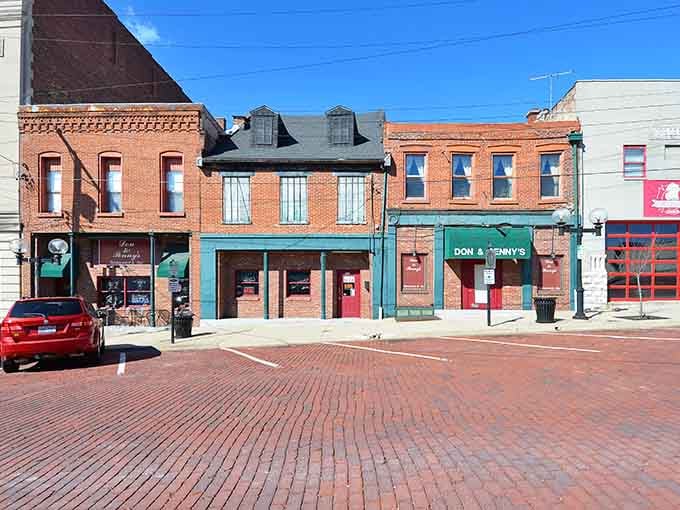 Brick-lined streets where local businesses thrive and nobody's trying to sell you timeshare presentations over lunch.