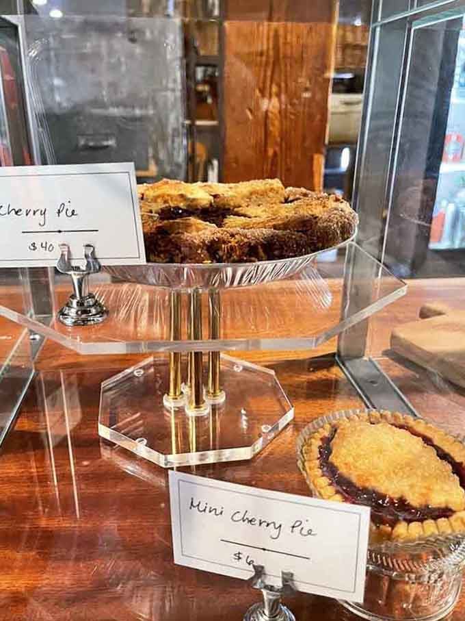 Those cherry pies are displayed like edible artwork, which is exactly what they are.