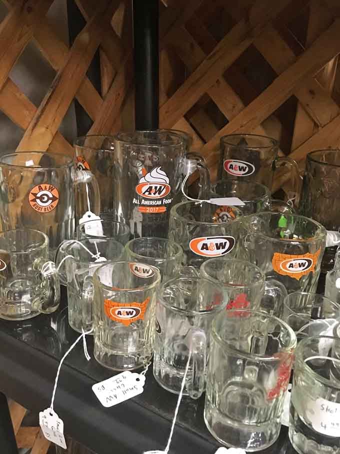 A&W root beer mugs lined up like soldiers, ready to transport you back to drive-in diners and simpler times.