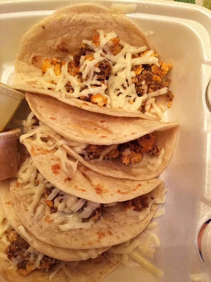 Chorizo tacos stacked high with melted cheese, because sometimes more is exactly what the doctor ordered for happiness.