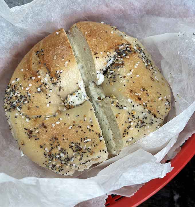 Garlic herb cream cheese on a toasted everything bagel&mdash;sometimes the simplest combinations create the most memorable breakfast moments.