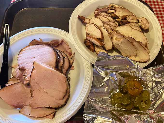 Sliced ham and chicken demonstrate that the smoker doesn't play favorites&mdash;everything gets the royal treatment here.