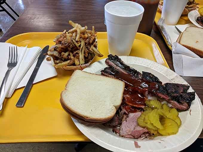 Those ribs have a smoke ring that would make competition pitmasters weep with envy and maybe a little jealousy.