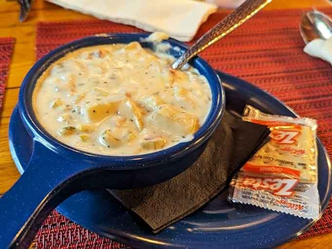 Creamy chowder served in a cast iron skillet with crackers is mountain comfort food at its absolute finest.