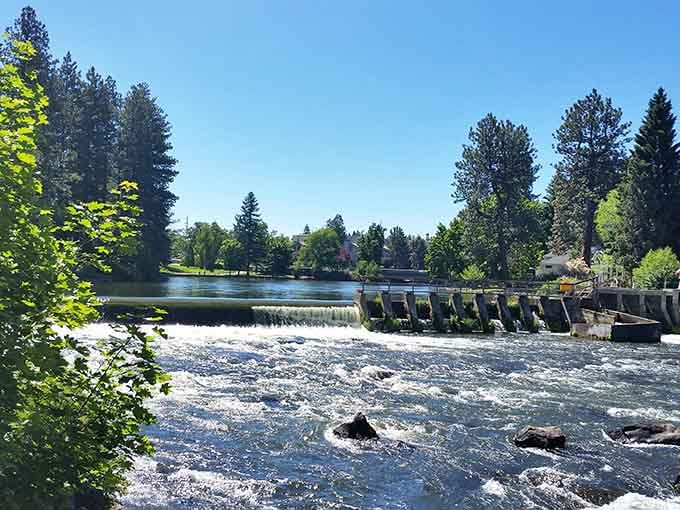 Where the river meets civilization, creating the perfect spot for kayakers to show off while you enjoy lunch.