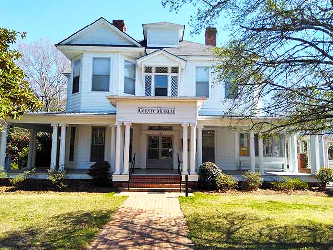 Victorian elegance meets museum charm in a building that preserves history better than your photo albums preserve those vacation memories.