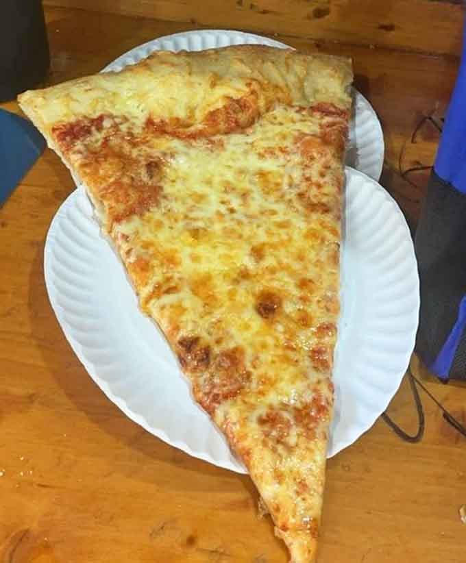 A plain cheese slice that requires structural engineering to eat properly is the best kind of problem to have.