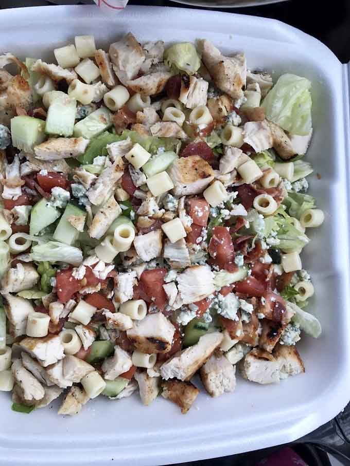 This chopped salad brings enough ingredients to qualify as a full neighborhood potluck in one convenient container.