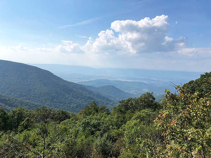 Layers of mountains fading into forever, making your daily commute view seem like a cruel joke by comparison.