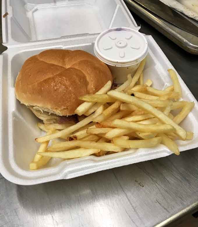 Classic pulled pork sandwich with crispy fries delivers comfort food that hits the spot without any unnecessary fuss or frills.