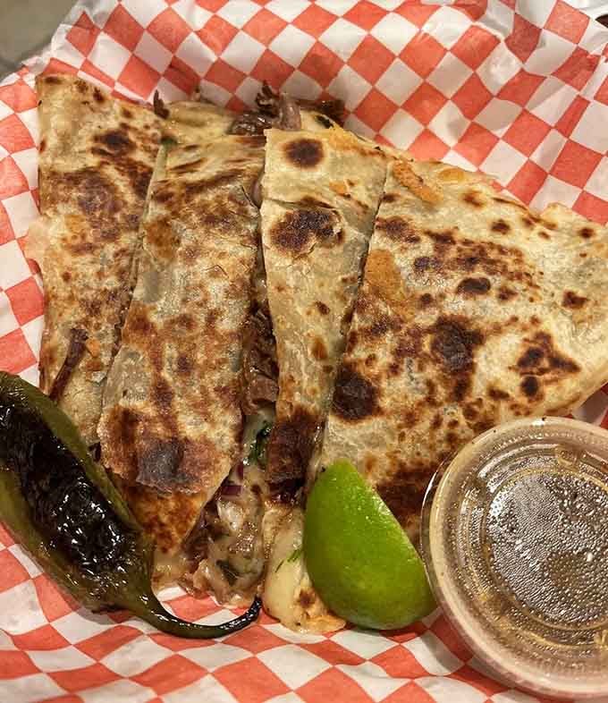Golden, crispy quesadilla perfection with that cheese pull that makes your phone camera come out automatically every time.