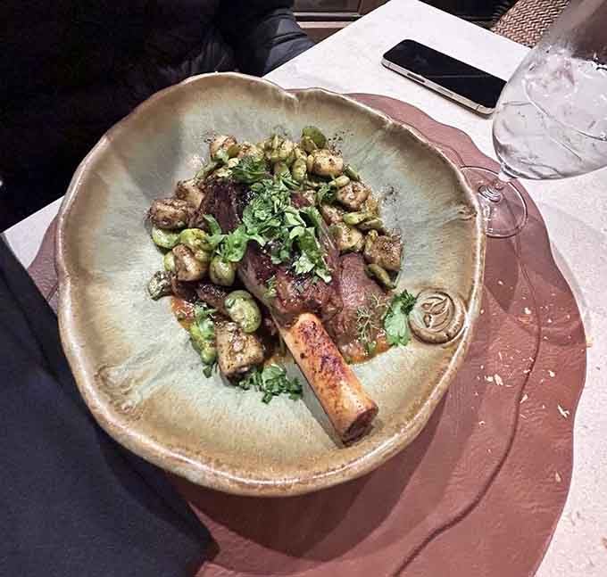 That lamb shank sits proudly on its bed of gnocchi like a king surveying his delicious kingdom of flavor.