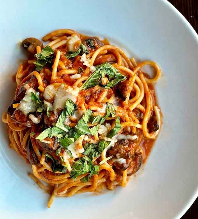 Spaghetti with meatballs that would make your nonna weep tears of joy and maybe a little jealousy.