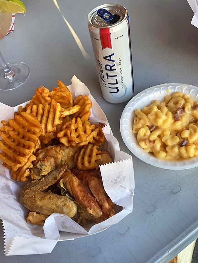 Fried chicken meets creamy mac and cheese in a combination that feels like a warm hug from grandma.