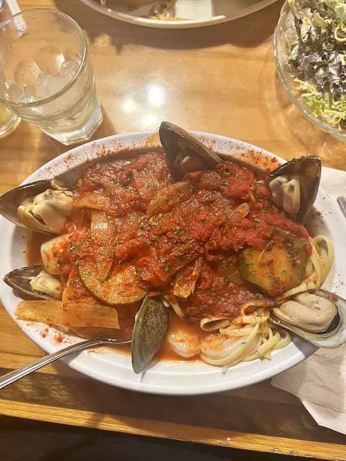 This bouillabaisse towers over the table like Godzilla attacking Tokyo, but way more delicious and friendly.