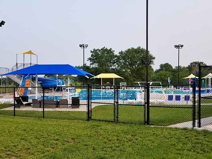 The community pool features slides and splash zones that beat paying resort prices any day.