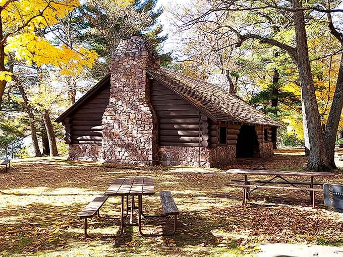 That stone chimney has seen more campfire stories than your favorite uncle, and it's not telling any secrets either.