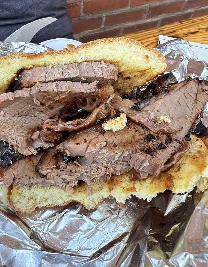 Brisket piled so high it defies gravity and possibly several laws of physics too.