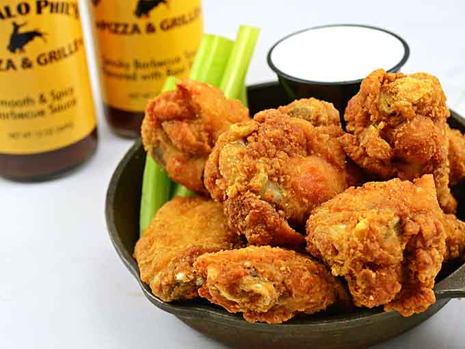 Golden fried chicken with that crackling crust and cool ranch dressing is pure nostalgic comfort on a plate.