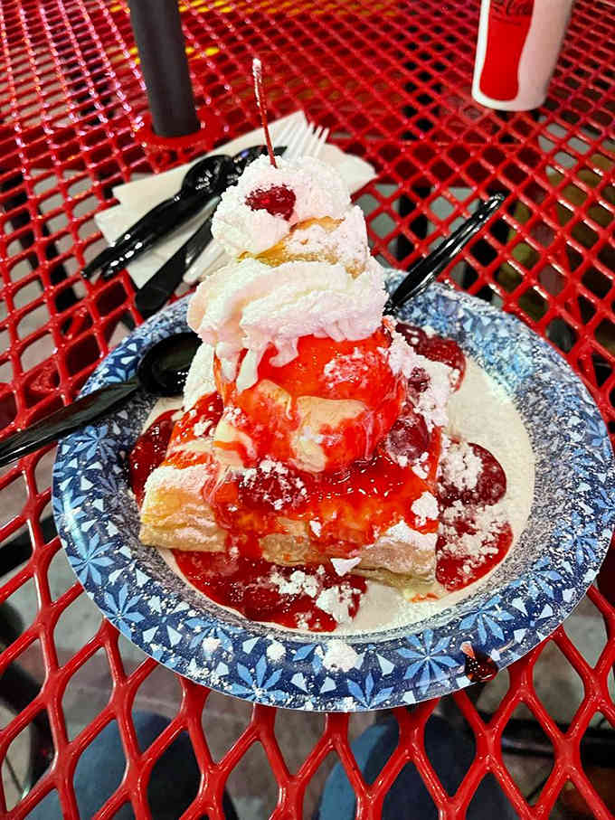 This strawberry creation looks like someone took a waffle and decided it needed to become a work of art.