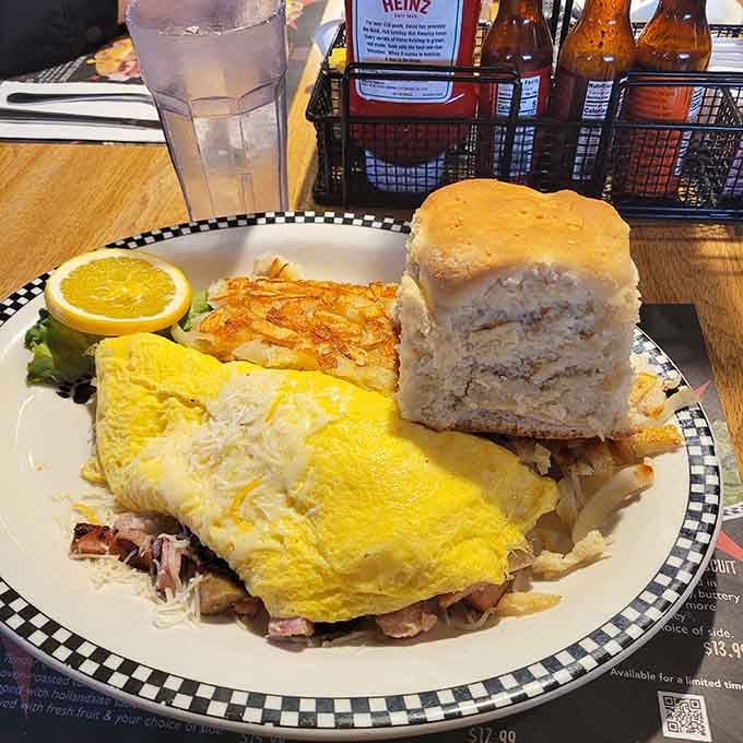 This omelet is stuffed fuller than your uncle's garage, with a biscuit that could probably stop a bullet if necessary.