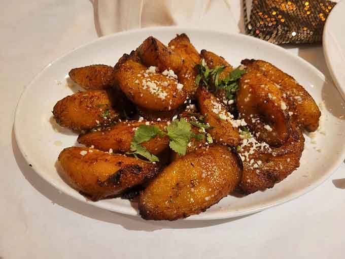 Golden plantains dusted with cheese prove that sometimes the simplest pleasures are the ones that make you audibly sigh with happiness.