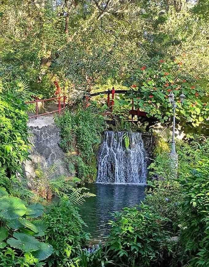 Finding this waterfall tucked away in the gardens is like discovering a secret level in your favorite game.