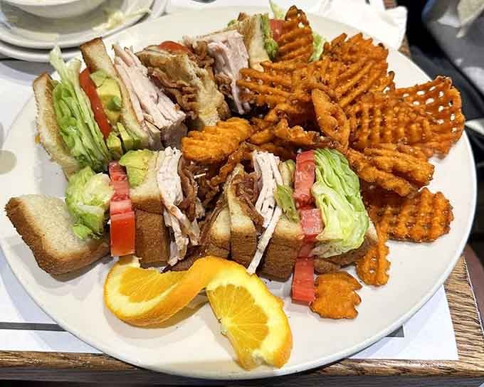 This turkey club comes stacked higher than your expectations, with waffle fries that deserve their own standing ovation.