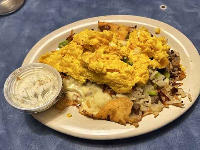 The Unusual Skillet lives up to its name, piling gyro meat onto hash browns like someone finally understood your breakfast dreams.