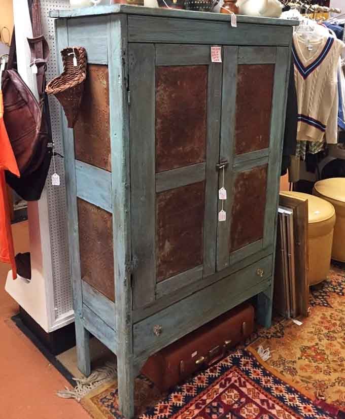That weathered turquoise cabinet has more character than most people you'll meet at brunch this weekend.