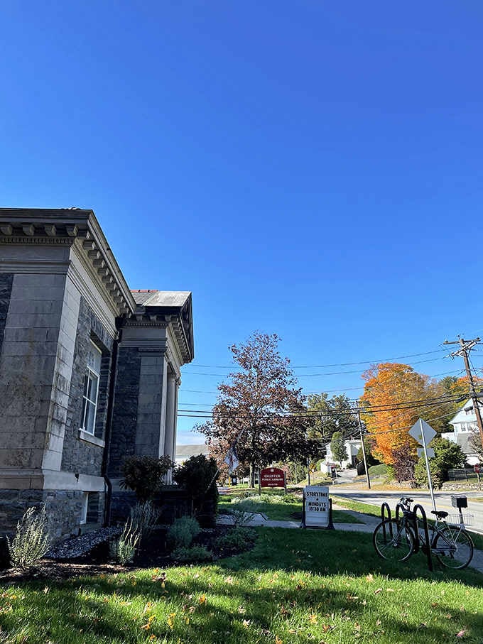 A library building that's seen more plot twists than the books inside, standing proud since Connecticut took architecture seriously.