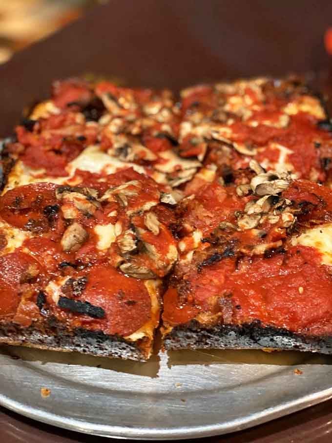 Pepperoni, bacon, and mushrooms on that signature thick crust with crispy edges &ndash; the holy trinity of pizza toppings.