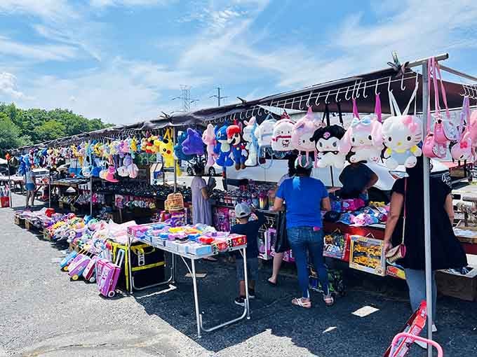 Giant plush character backpacks tower overhead, making every kid's carnival prize dreams come true affordably.