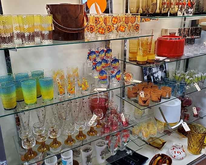 Vintage glassware in every color of the rainbow catches the light like edible jewels for your table.