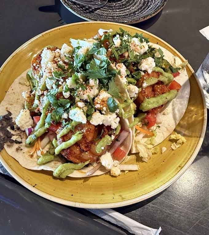 Shrimp tacos loaded with fresh toppings and enough cilantro to make you forget you're hundreds of miles from any ocean.