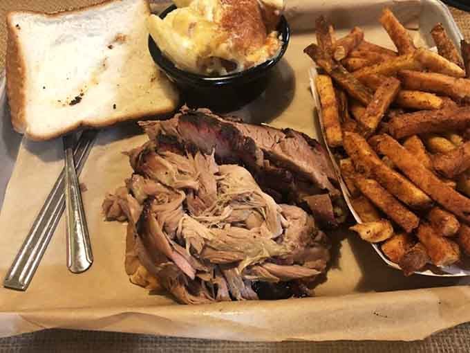 Pulled pork, sliced brisket, and fries together on one plate is basically the definition of making good life choices.