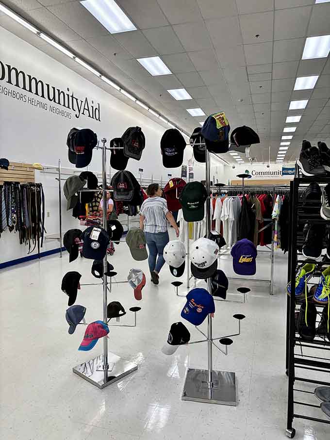 Baseball caps displayed like crown jewels, because every head deserves its perfect topper.