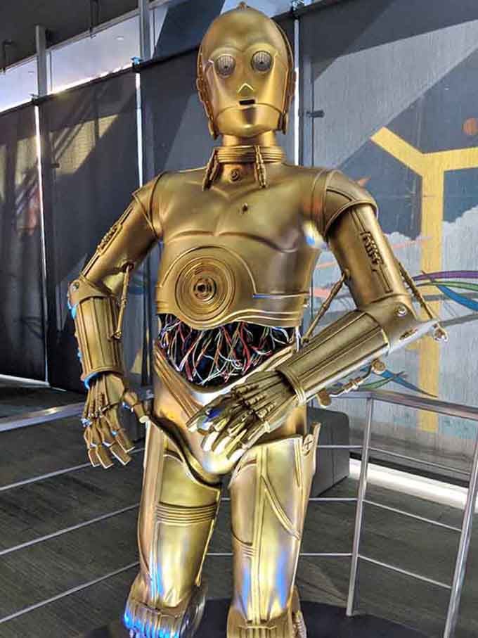 C-3PO looking as shiny and worried as ever, probably calculating the odds of you touching the display.