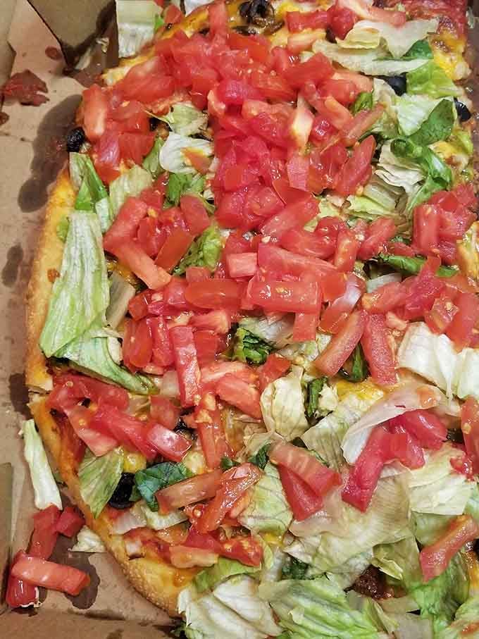 Taco pizza brings two beloved comfort foods together in a mashup that actually works better than expected.