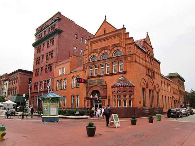 The historic red-brick landmark rises in terracotta splendor, a reminder of when downtown architecture was built to impress as much as to endure.