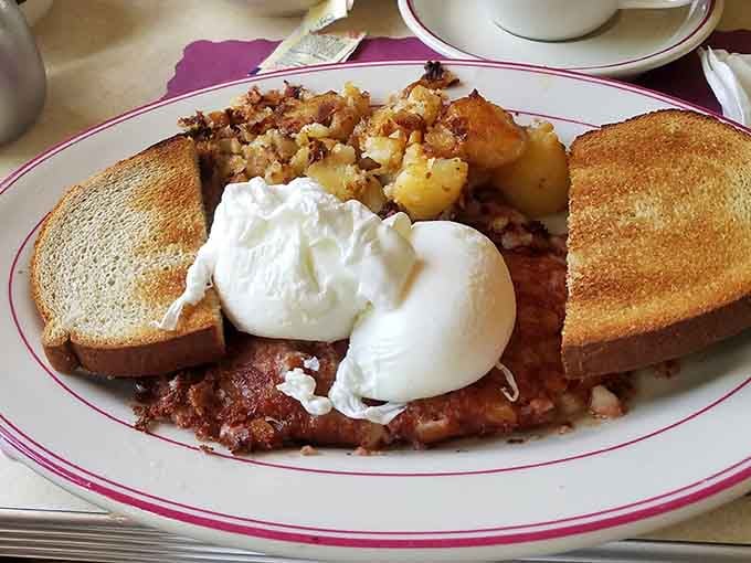 Poached eggs crowning corned beef hash with a dollop of sour cream is pure comfort food poetry.