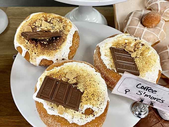 Coffee and S'mores had a baby, and it's sitting on these doughnuts looking absolutely magnificent and campfire-ready.