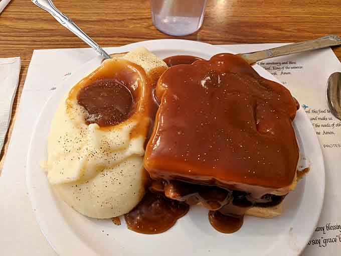 Hot beef sandwich drowning in gravy with a side of mashed potatoes: cardiologists look away now.