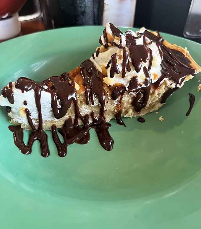 That chocolate drizzle is working overtime, turning an already impressive pie into pure temptation on a plate.