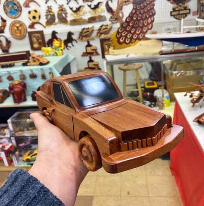 This handcrafted wooden car proves someone has way more patience and skill than the rest of us mere mortals combined.