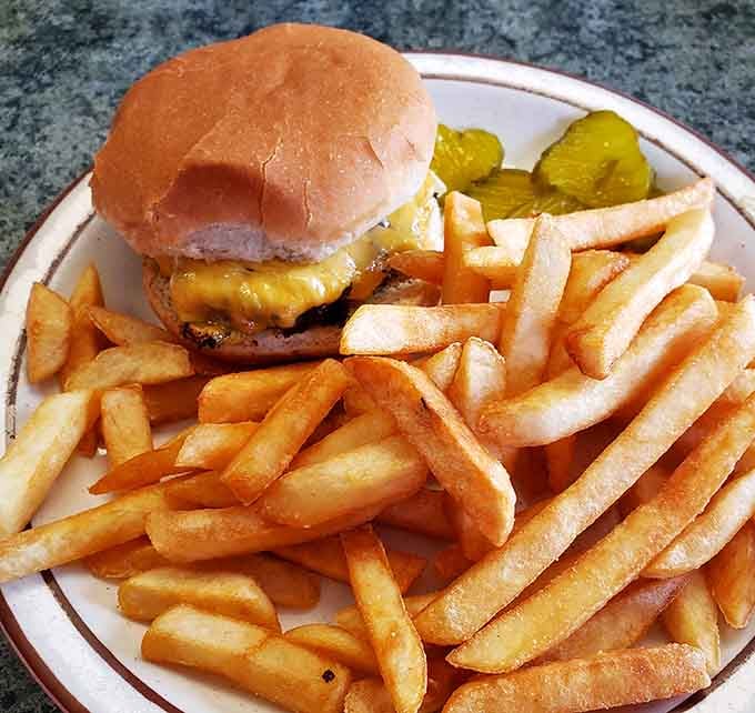 Sometimes a burger and a mountain of fries is the only answer, and this plate knows it perfectly well.