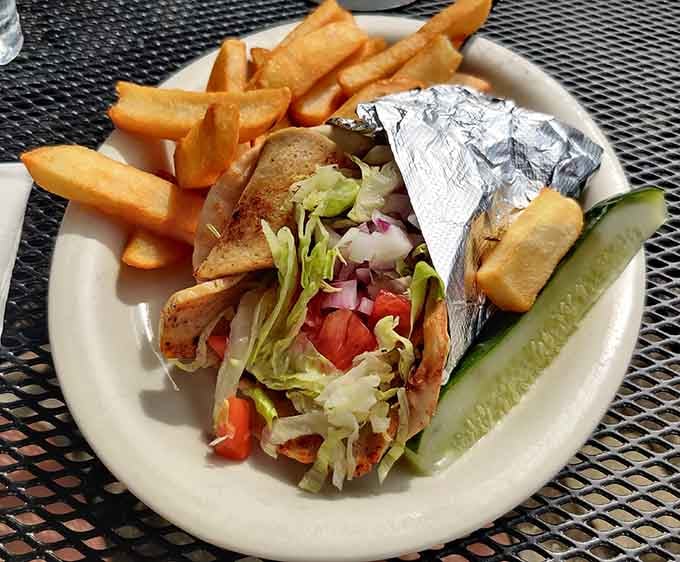 A gyro wrapped tight and served with fries, because sometimes lunch needs to crash the all-day breakfast party.
